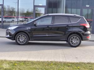 Black Ford Kuga 2014 in Siauliai, with an engine capacity of 2.00 L and mileage of 214 thousand km for 7700 €, photo 8 on AUTOMOTO.COM.LV
