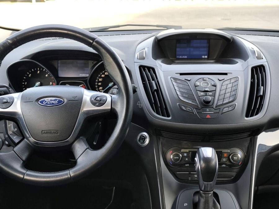 Black Ford Kuga 2014 in Siauliai, with an engine capacity of 2.00 L and mileage of 214 thousand km for 7700 €, photo 9 on AUTOMOTO.COM.LV