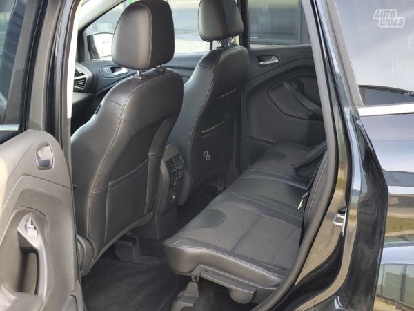 Black Ford Kuga 2014 in Siauliai, with an engine capacity of 2.00 L and mileage of 214 thousand km for 7700 €, photo 9 on AUTOMOTO.COM.LV
