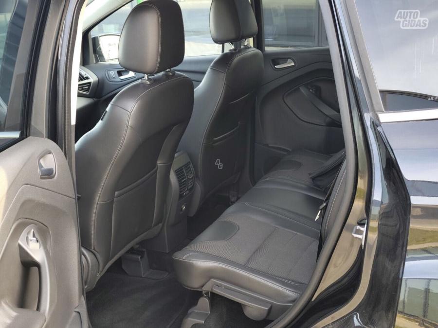 Black Ford Kuga 2014 in Siauliai, with an engine capacity of 2.00 L and mileage of 214 thousand km for 7700 €, photo 10 on AUTOMOTO.COM.LV