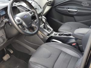 Black Ford Kuga 2014 in Siauliai, with an engine capacity of 2.00 L and mileage of 214 thousand km for 7700 €, photo 11 on AUTOMOTO.COM.LV