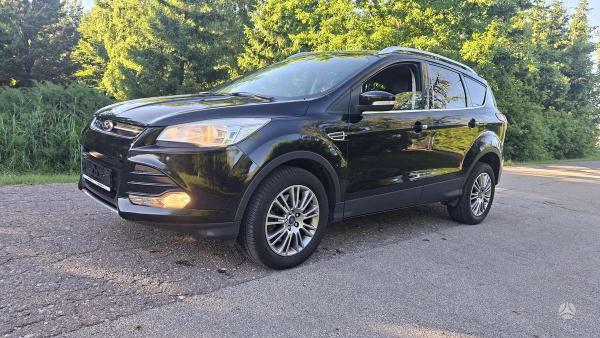 Black Ford Kuga 2014 in Kaunas, with an engine capacity of 2.00 L and mileage of 173 thousand km for 7850 €, photo 4 on AUTOMOTO.COM.LV
