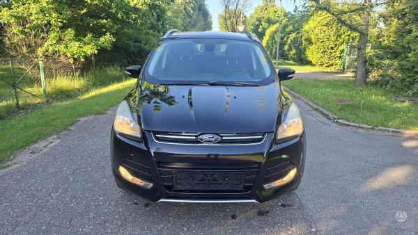 Black Ford Kuga 2014 in Kaunas, with an engine capacity of 2.00 L and mileage of 173 thousand km for 7850 €, photo 5 on AUTOMOTO.COM.LV