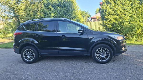 Black Ford Kuga 2014 in Kaunas, with an engine capacity of 2.00 L and mileage of 173 thousand km for 7850 €, photo 7 on AUTOMOTO.COM.LV