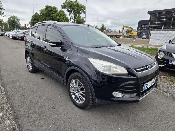 Black Ford Kuga 2014 in Taurage, with an engine capacity of 2.00 L and mileage of 135 thousand km for 7700 €, photo 1 on AUTOMOTO.COM.LV