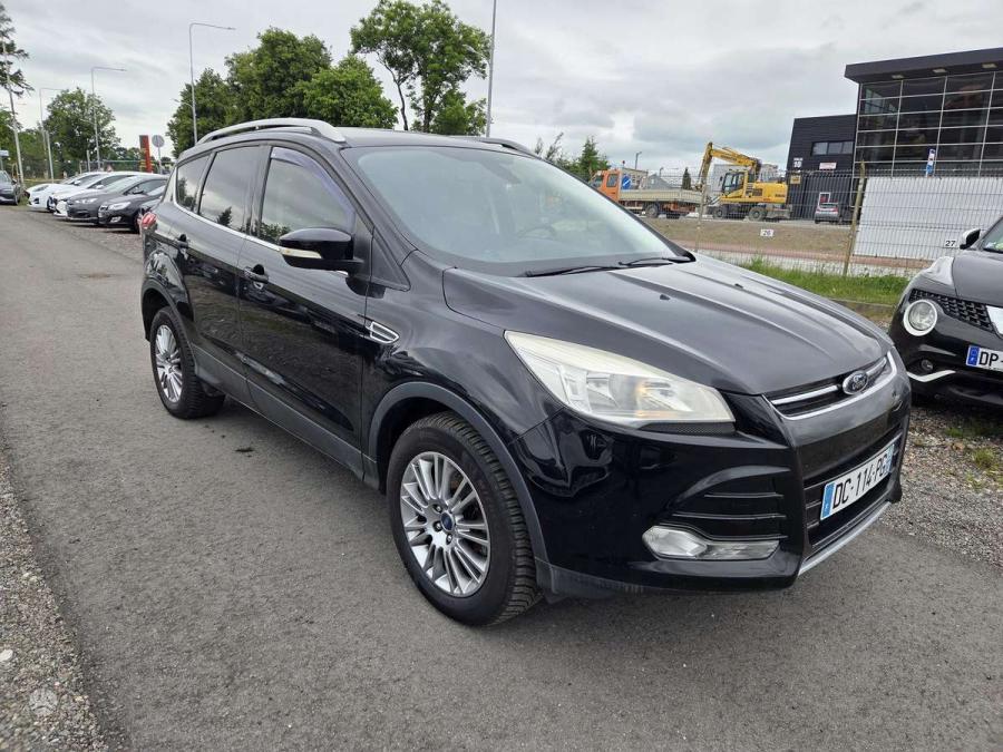 Black Ford Kuga 2014 in Taurage, with an engine capacity of 2.00 L and mileage of 135 thousand km for 7700 €, photo 1 on AUTOMOTO.COM.LV