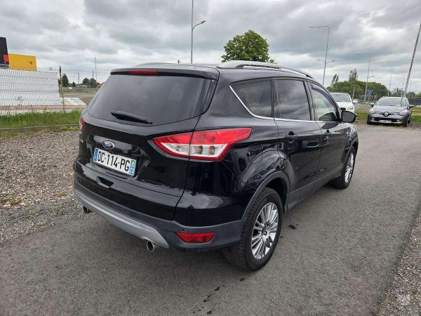 Black Ford Kuga 2014 in Taurage, with an engine capacity of 2.00 L and mileage of 135 thousand km for 7700 €, photo 3 on AUTOMOTO.COM.LV