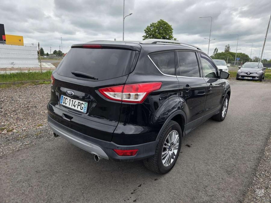 Black Ford Kuga 2014 in Taurage, with an engine capacity of 2.00 L and mileage of 135 thousand km for 7700 €, photo 4 on AUTOMOTO.COM.LV