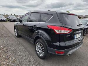 Black Ford Kuga 2014 in Taurage, with an engine capacity of 2.00 L and mileage of 135 thousand km for 7700 €, photo 5 on AUTOMOTO.COM.LV