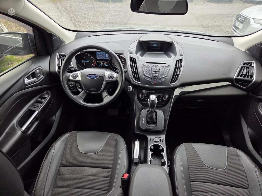 Black Ford Kuga 2014 in Taurage, with an engine capacity of 2.00 L and mileage of 135 thousand km for 7700 €, photo 6 on AUTOMOTO.COM.LV
