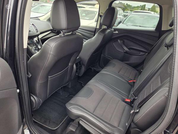 Black Ford Kuga 2014 in Taurage, with an engine capacity of 2.00 L and mileage of 135 thousand km for 7700 €, photo 6 on AUTOMOTO.COM.LV