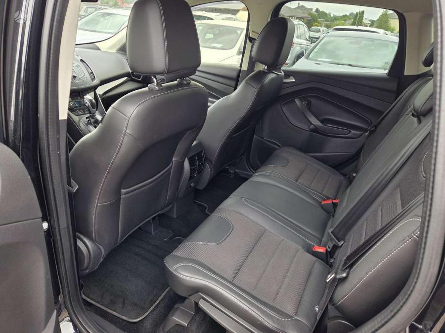 Black Ford Kuga 2014 in Taurage, with an engine capacity of 2.00 L and mileage of 135 thousand km for 7700 €, photo 7 on AUTOMOTO.COM.LV