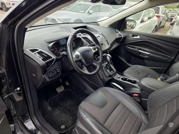 Black Ford Kuga 2014 in Taurage, with an engine capacity of 2.00 L and mileage of 135 thousand km for 7700 €, photo 7 on AUTOMOTO.COM.LV