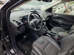 Black Ford Kuga 2014 in Taurage, with an engine capacity of 2.00 L and mileage of 135 thousand km for 7700 €, photo 8 on AUTOMOTO.COM.LV