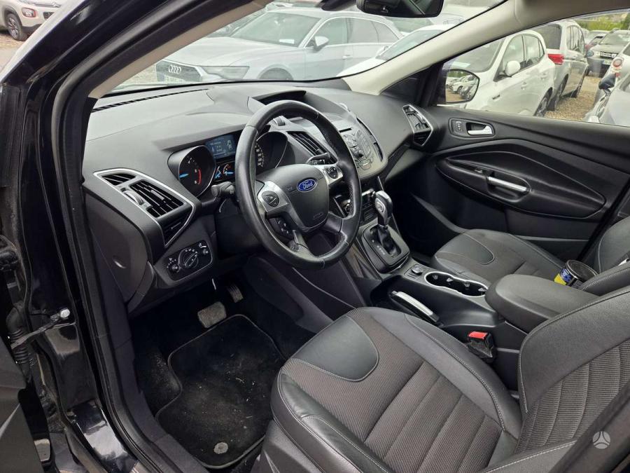 Black Ford Kuga 2014 in Taurage, with an engine capacity of 2.00 L and mileage of 135 thousand km for 7700 €, photo 8 on AUTOMOTO.COM.LV
