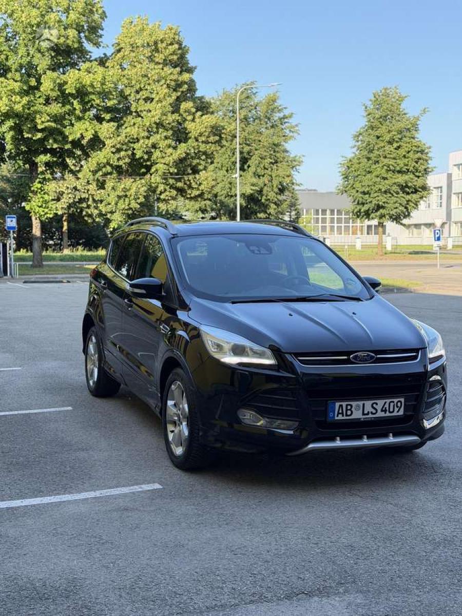 Black Ford Kuga 2014 in Silute, with an engine capacity of 2.00 L and mileage of 246 thousand km for 7500 €, photo 3 on AUTOMOTO.COM.LV