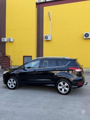 Black Ford Kuga 2014 in Silute, with an engine capacity of 2.00 L and mileage of 246 thousand km for 7500 €, photo 4 on AUTOMOTO.COM.LV
