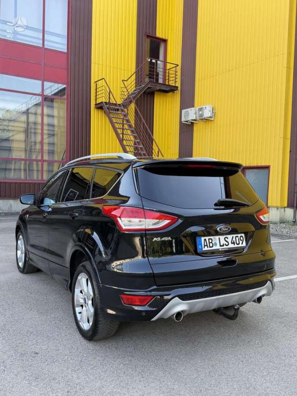 Black Ford Kuga 2014 in Silute, with an engine capacity of 2.00 L and mileage of 246 thousand km for 7500 €, photo 4 on AUTOMOTO.COM.LV