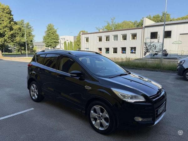 Black Ford Kuga 2014 in Silute, with an engine capacity of 2.00 L and mileage of 246 thousand km for 7500 €, photo 6 on AUTOMOTO.COM.LV