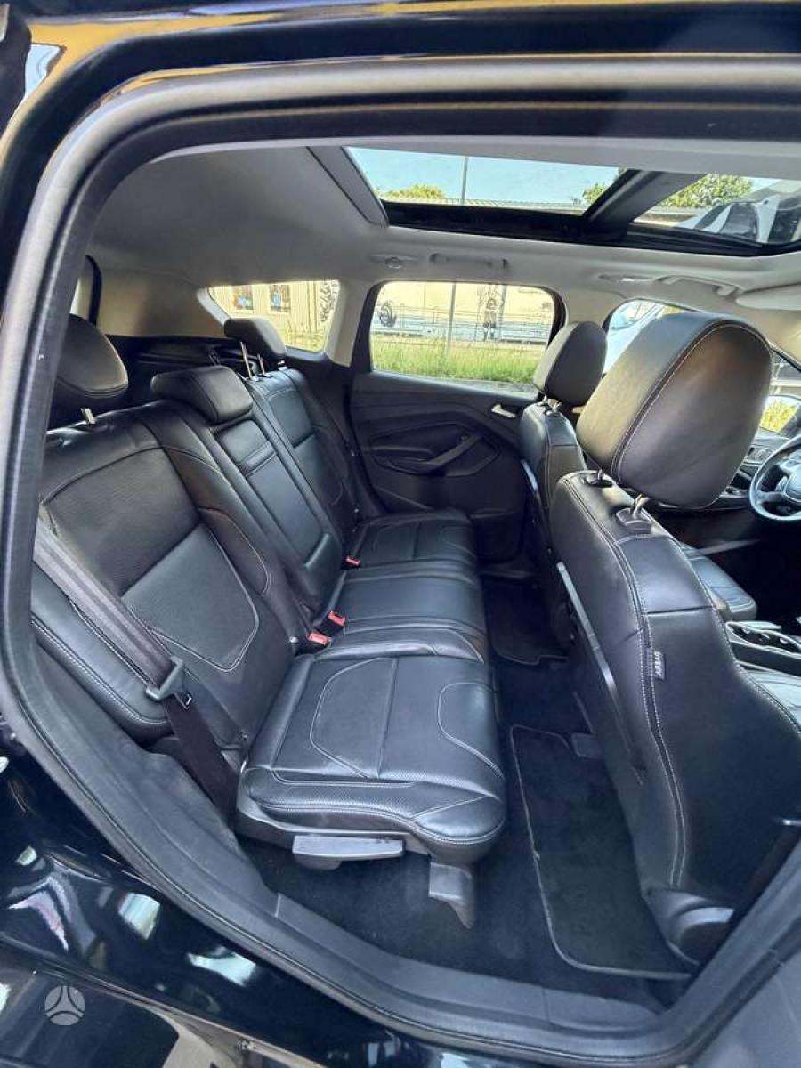 Black Ford Kuga 2014 in Silute, with an engine capacity of 2.00 L and mileage of 246 thousand km for 7500 €, photo 12 on AUTOMOTO.COM.LV