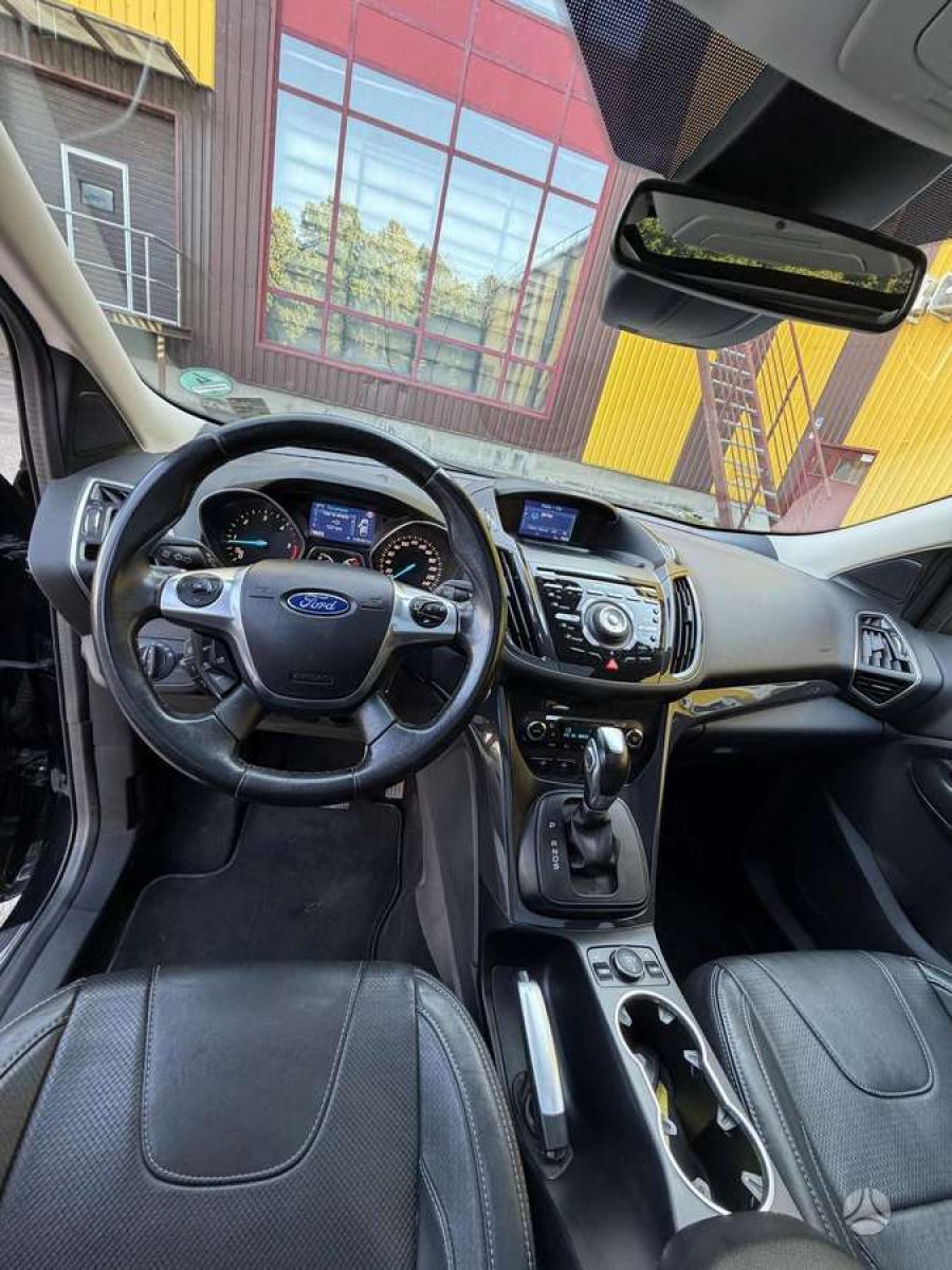 Black Ford Kuga 2014 in Silute, with an engine capacity of 2.00 L and mileage of 246 thousand km for 7500 €, photo 15 on AUTOMOTO.COM.LV