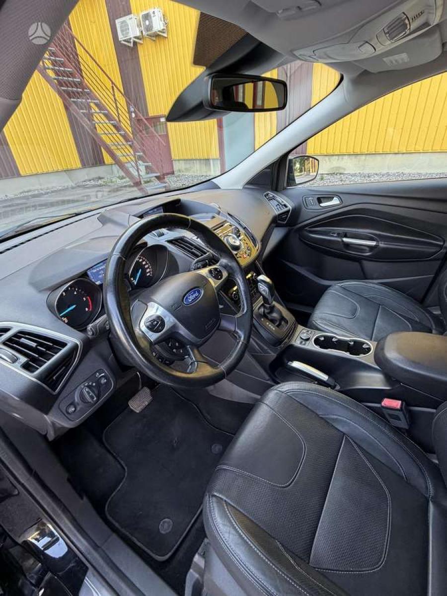 Black Ford Kuga 2014 in Silute, with an engine capacity of 2.00 L and mileage of 246 thousand km for 7500 €, photo 17 on AUTOMOTO.COM.LV