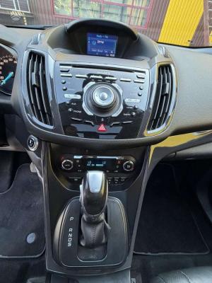 Black Ford Kuga 2014 in Silute, with an engine capacity of 2.00 L and mileage of 246 thousand km for 7500 €, photo 18 on AUTOMOTO.COM.LV