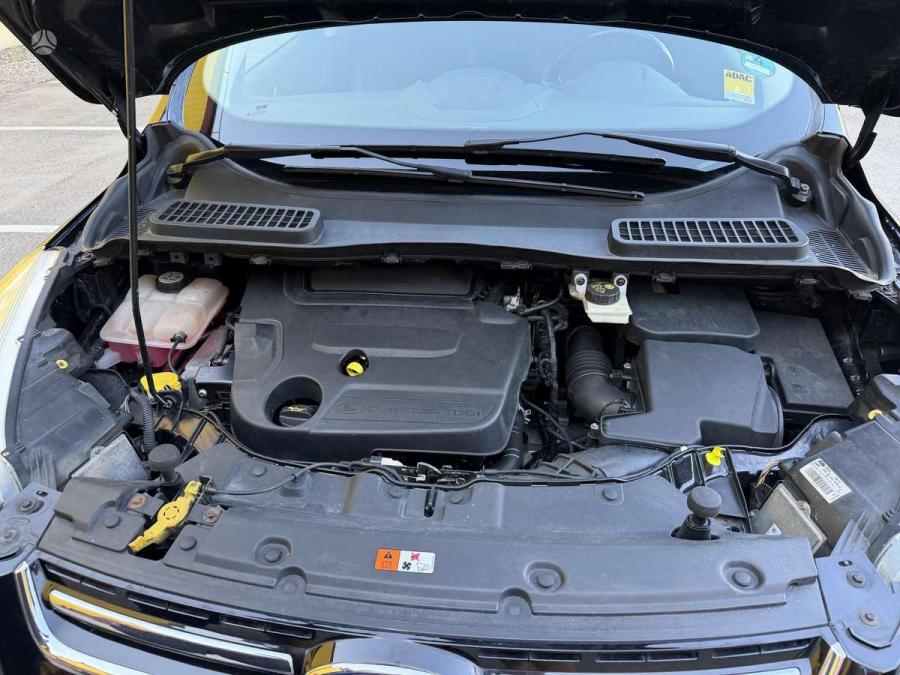 Black Ford Kuga 2014 in Silute, with an engine capacity of 2.00 L and mileage of 246 thousand km for 7500 €, photo 19 on AUTOMOTO.COM.LV