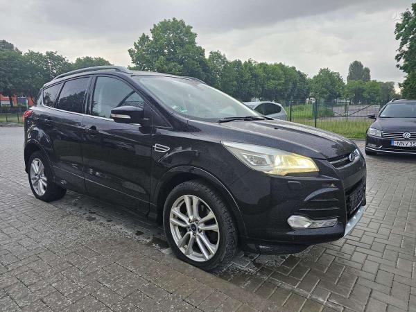 Black Ford Kuga 2014 in Kaunas, with an engine capacity of 2.00 L and mileage of 271 thousand km for 7999 €, photo 3 on AUTOMOTO.COM.LV