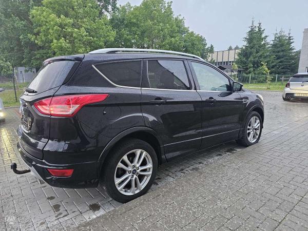 Black Ford Kuga 2014 in Kaunas, with an engine capacity of 2.00 L and mileage of 271 thousand km for 7999 €, photo 4 on AUTOMOTO.COM.LV