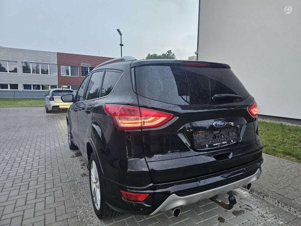 Black Ford Kuga 2014 in Kaunas, with an engine capacity of 2.00 L and mileage of 271 thousand km for 7999 €, photo 6 on AUTOMOTO.COM.LV