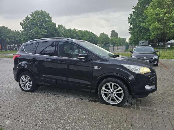 Black Ford Kuga 2014 in Kaunas, with an engine capacity of 2.00 L and mileage of 271 thousand km for 7999 €, photo 9 on AUTOMOTO.COM.LV