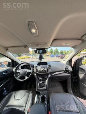 Black Ford Kuga 2014 in Ventspils, with an engine capacity of 2.00 L and mileage of 260 thousand km for 7400 €, photo 3 on AUTOMOTO.COM.LV
