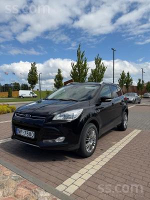 Black Ford Kuga 2014 in Ventspils, with an engine capacity of 2.00 L and mileage of 260 thousand km for 7400 €, photo 4 on AUTOMOTO.COM.LV