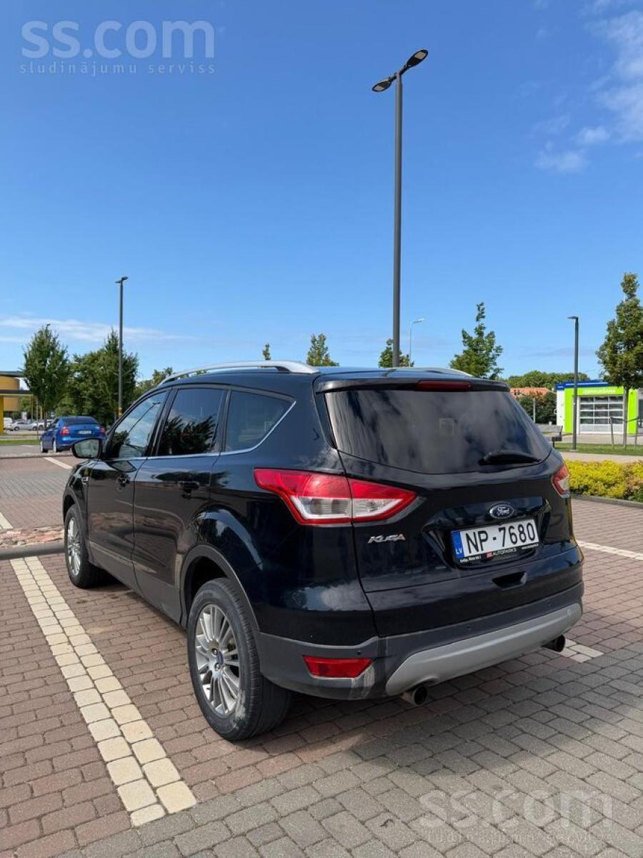 Black Ford Kuga 2014 in Ventspils, with an engine capacity of 2.00 L and mileage of 260 thousand km for 7400 €, photo 5 on AUTOMOTO.COM.LV