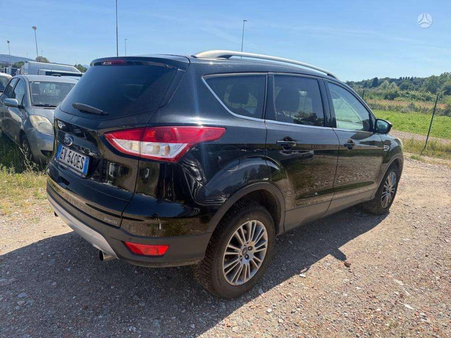 Black Ford Kuga 2014 in Siauliai, with an engine capacity of 2.00 L and mileage of 145 thousand km for 7150 €, photo 4 on AUTOMOTO.COM.LV