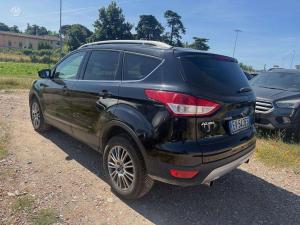 Black Ford Kuga 2014 in Siauliai, with an engine capacity of 2.00 L and mileage of 145 thousand km for 7150 €, photo 6 on AUTOMOTO.COM.LV