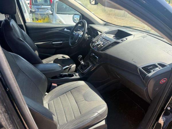 Black Ford Kuga 2014 in Siauliai, with an engine capacity of 2.00 L and mileage of 145 thousand km for 7150 €, photo 6 on AUTOMOTO.COM.LV