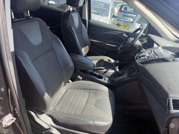 Black Ford Kuga 2014 in Siauliai, with an engine capacity of 2.00 L and mileage of 145 thousand km for 7150 €, photo 7 on AUTOMOTO.COM.LV