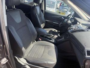Black Ford Kuga 2014 in Siauliai, with an engine capacity of 2.00 L and mileage of 145 thousand km for 7150 €, photo 8 on AUTOMOTO.COM.LV