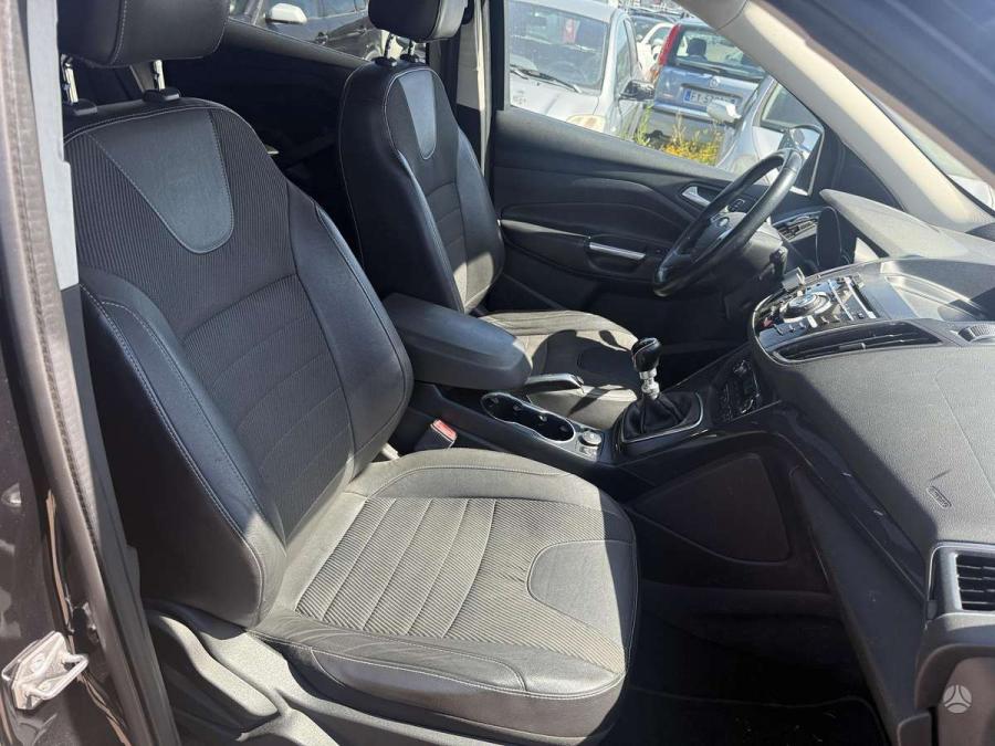Black Ford Kuga 2014 in Siauliai, with an engine capacity of 2.00 L and mileage of 145 thousand km for 7150 €, photo 8 on AUTOMOTO.COM.LV
