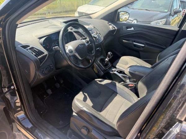 Black Ford Kuga 2014 in Siauliai, with an engine capacity of 2.00 L and mileage of 145 thousand km for 7150 €, photo 8 on AUTOMOTO.COM.LV