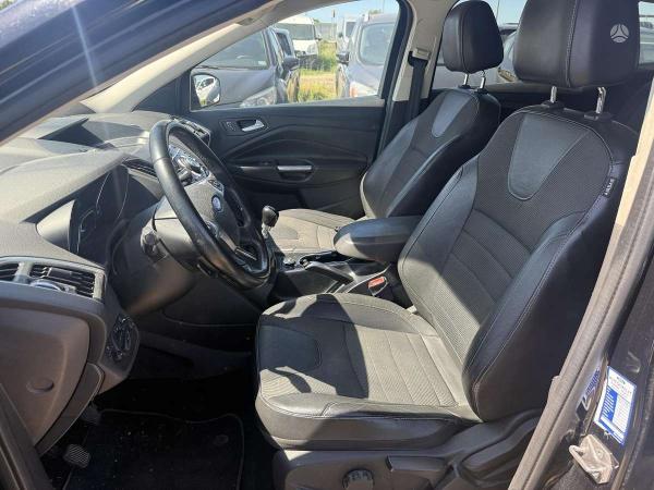 Black Ford Kuga 2014 in Siauliai, with an engine capacity of 2.00 L and mileage of 145 thousand km for 7150 €, photo 9 on AUTOMOTO.COM.LV