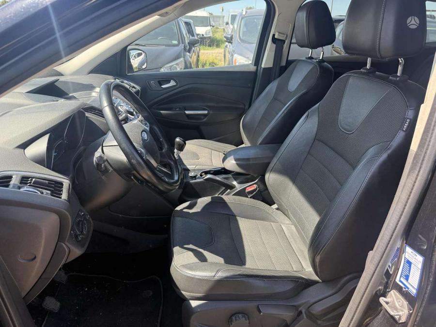 Black Ford Kuga 2014 in Siauliai, with an engine capacity of 2.00 L and mileage of 145 thousand km for 7150 €, photo 10 on AUTOMOTO.COM.LV