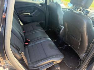 Black Ford Kuga 2014 in Siauliai, with an engine capacity of 2.00 L and mileage of 145 thousand km for 7150 €, photo 11 on AUTOMOTO.COM.LV