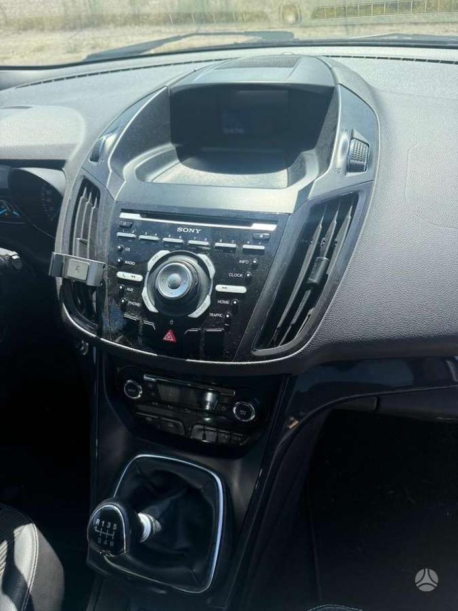 Black Ford Kuga 2014 in Siauliai, with an engine capacity of 2.00 L and mileage of 145 thousand km for 7150 €, photo 12 on AUTOMOTO.COM.LV