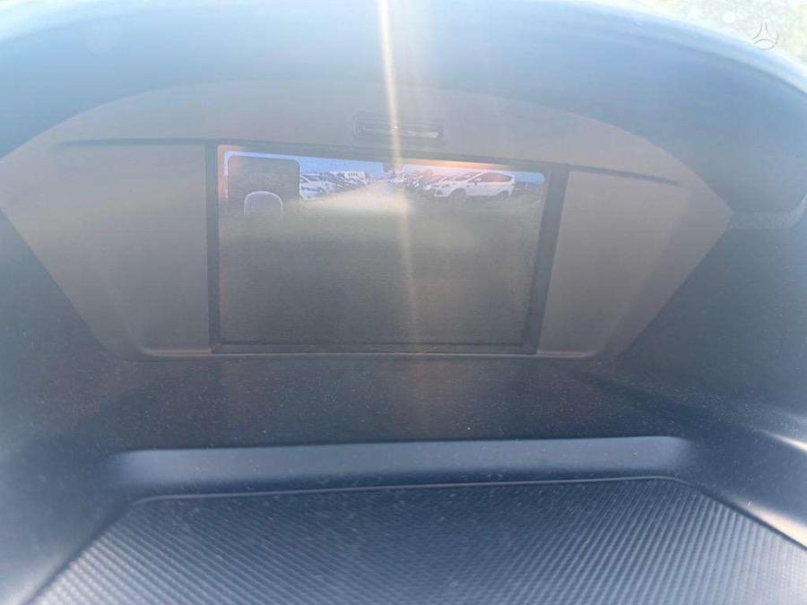 Black Ford Kuga 2014 in Siauliai, with an engine capacity of 2.00 L and mileage of 145 thousand km for 7150 €, photo 16 on AUTOMOTO.COM.LV