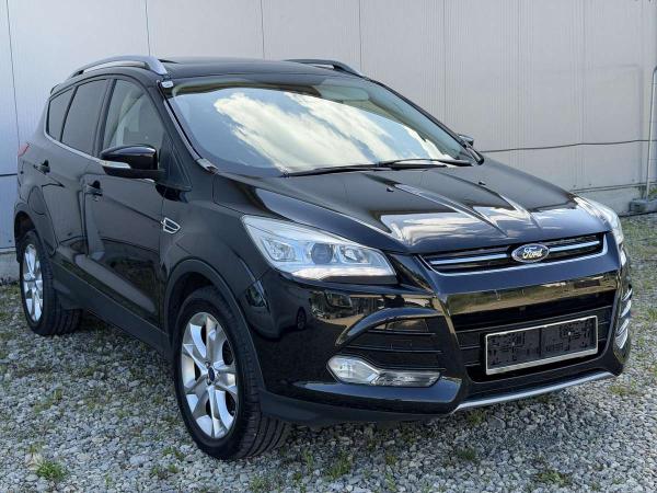 Black Ford Kuga 2014 in Kaunas, with an engine capacity of 2.00 L and mileage of 214 thousand km for 7700 €, photo 3 on AUTOMOTO.COM.LV