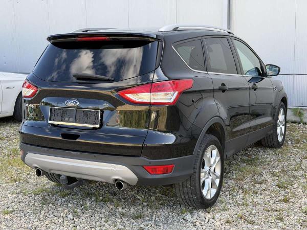 Black Ford Kuga 2014 in Kaunas, with an engine capacity of 2.00 L and mileage of 214 thousand km for 7700 €, photo 9 on AUTOMOTO.COM.LV