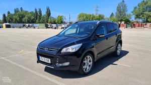 Black Ford Kuga 2014 in Klaipeda, with an engine capacity of 2.00 L and mileage of 261 thousand km for 6920 €, photo  on AUTOMOTO.COM.LV
